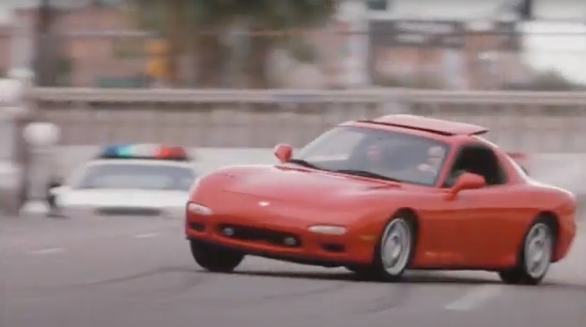 An FD Mazda RX-7 leads police on wild car chase in this cheesy 1994 ...