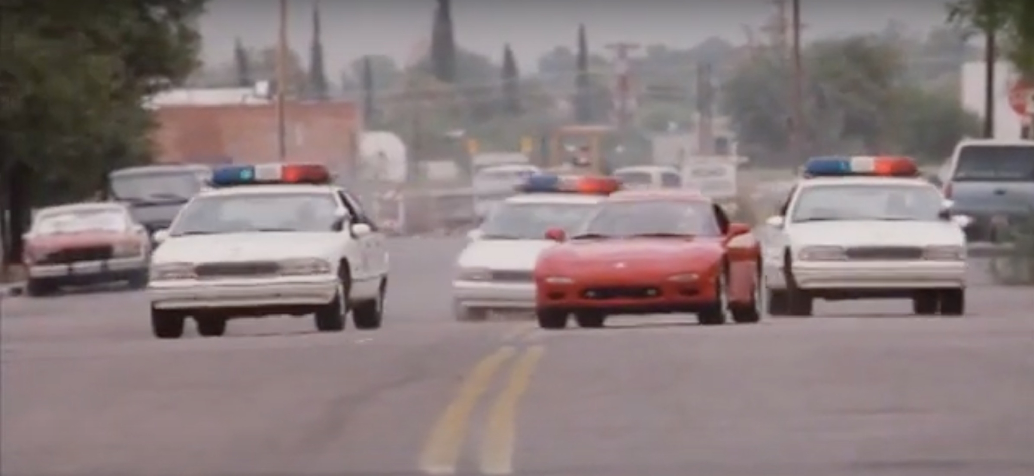 An FD Mazda RX-7 leads police on wild car chase in this cheesy 1994 ...